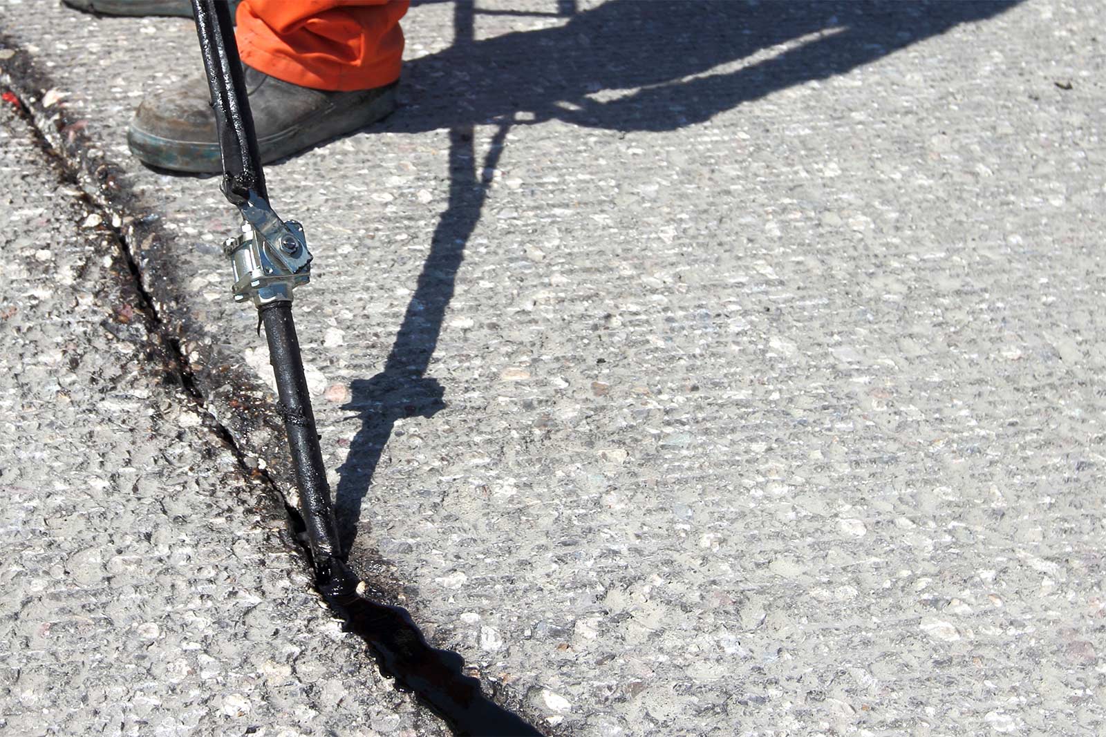 Asphalt Crack Sealing | Coatings, Inc. | Best Asphalt Repair
